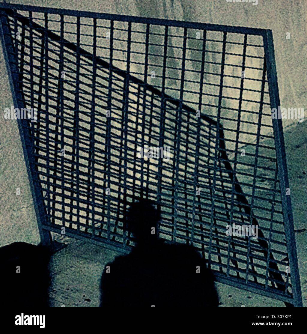 Abstract gate and shadows Stock Photo - Alamy