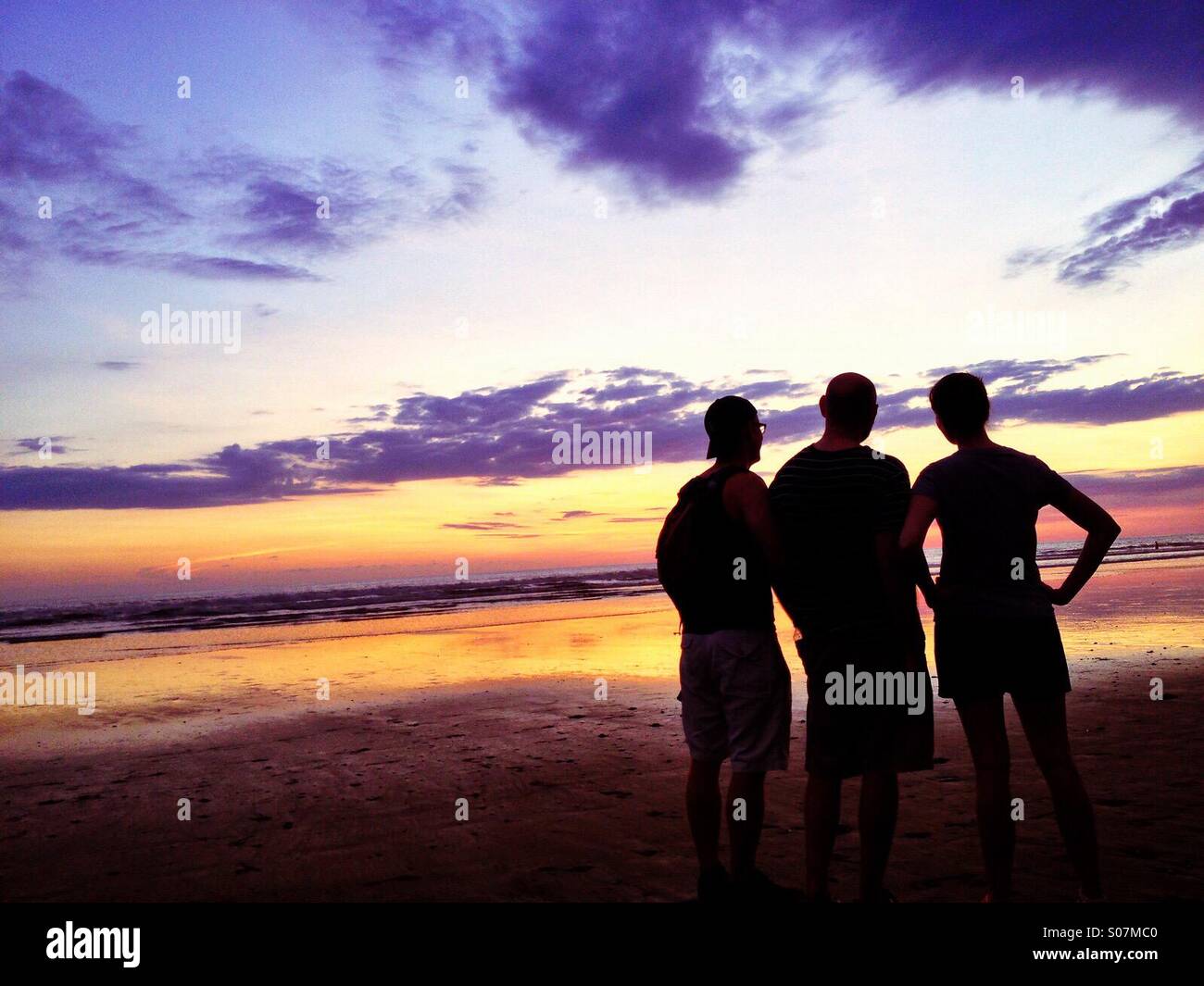 Three friends on the beach, Pacific Ocean, Costa Rica Stock Photo - Alamy