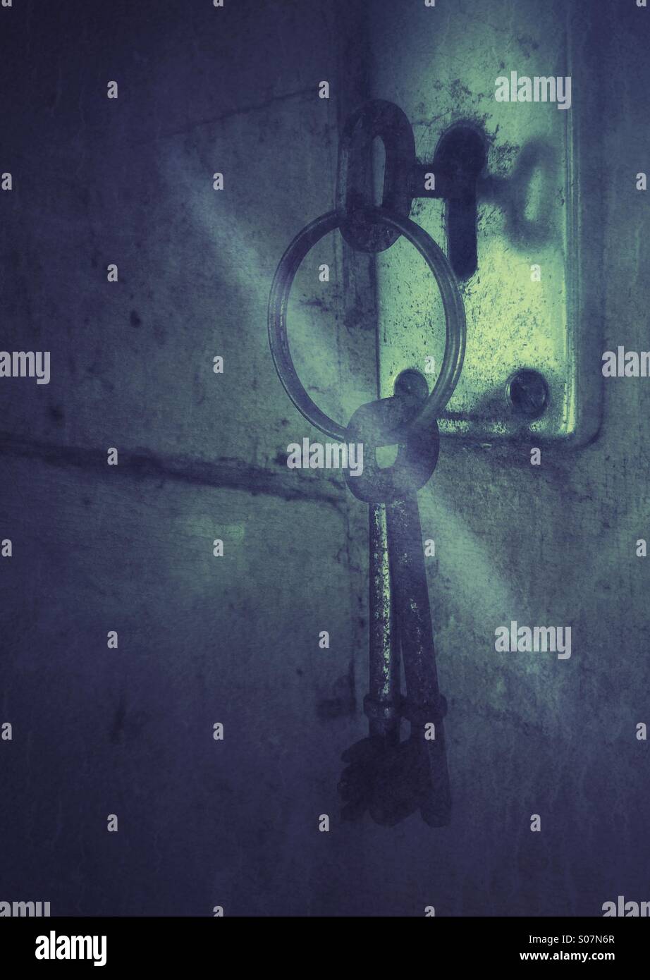 Rusty keys in old door lock Stock Photo - Alamy