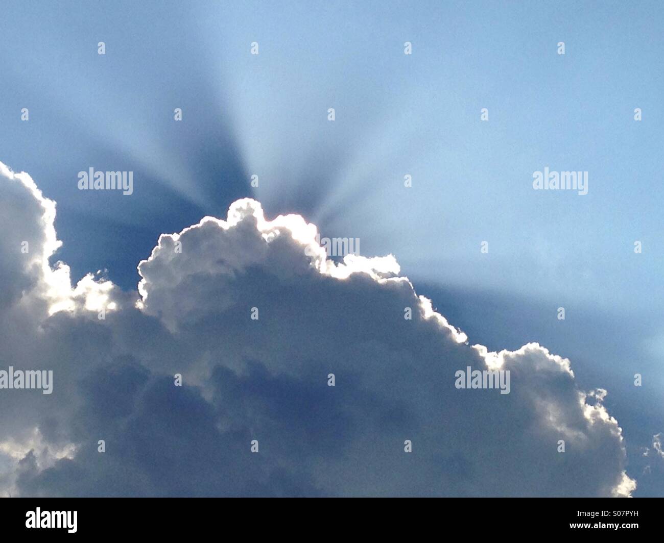 Sunlight breaking through the clouds hi-res stock photography and ...
