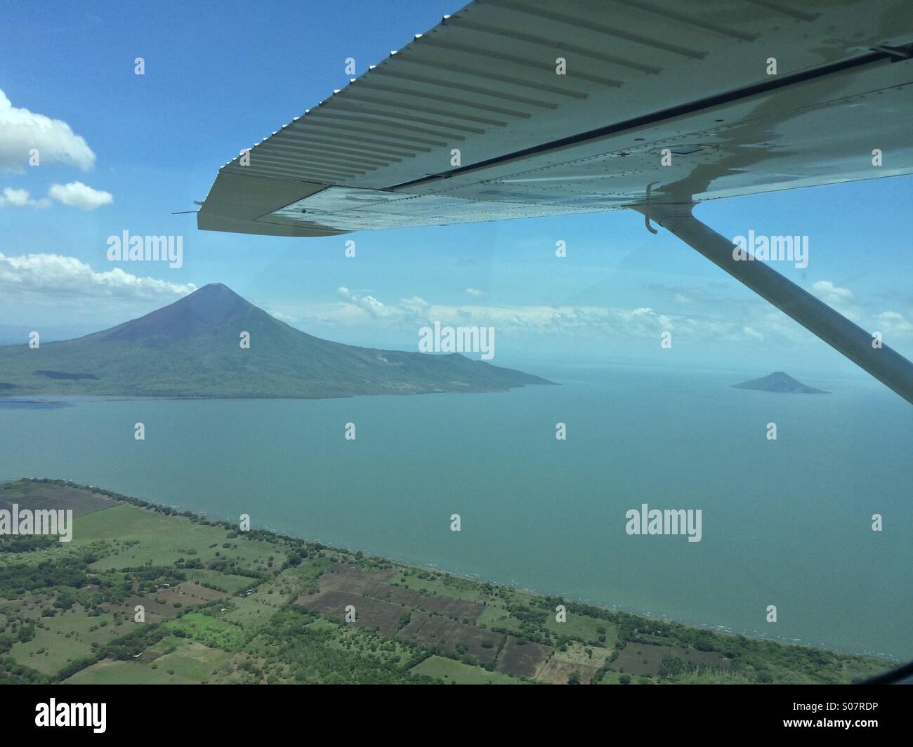 Volcano viewed from an airplane Stock Photo - Alamy