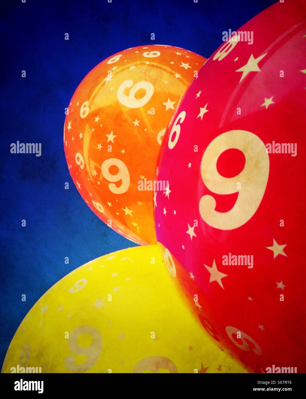 Three party balloons Stock Photo - Alamy