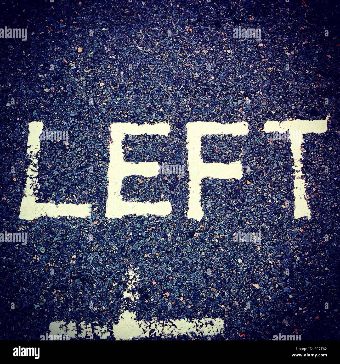 Word LEFT written on the road Stock Photo - Alamy