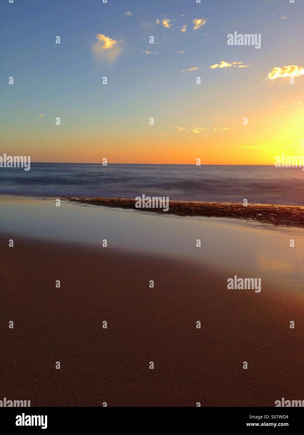 Sunset in Makaha, HI Stock Photo - Alamy