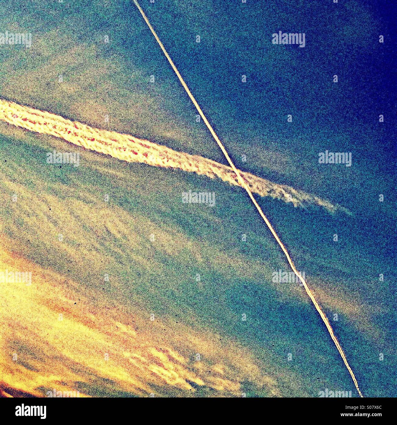 Vapor trail cross Stock Photo - Alamy