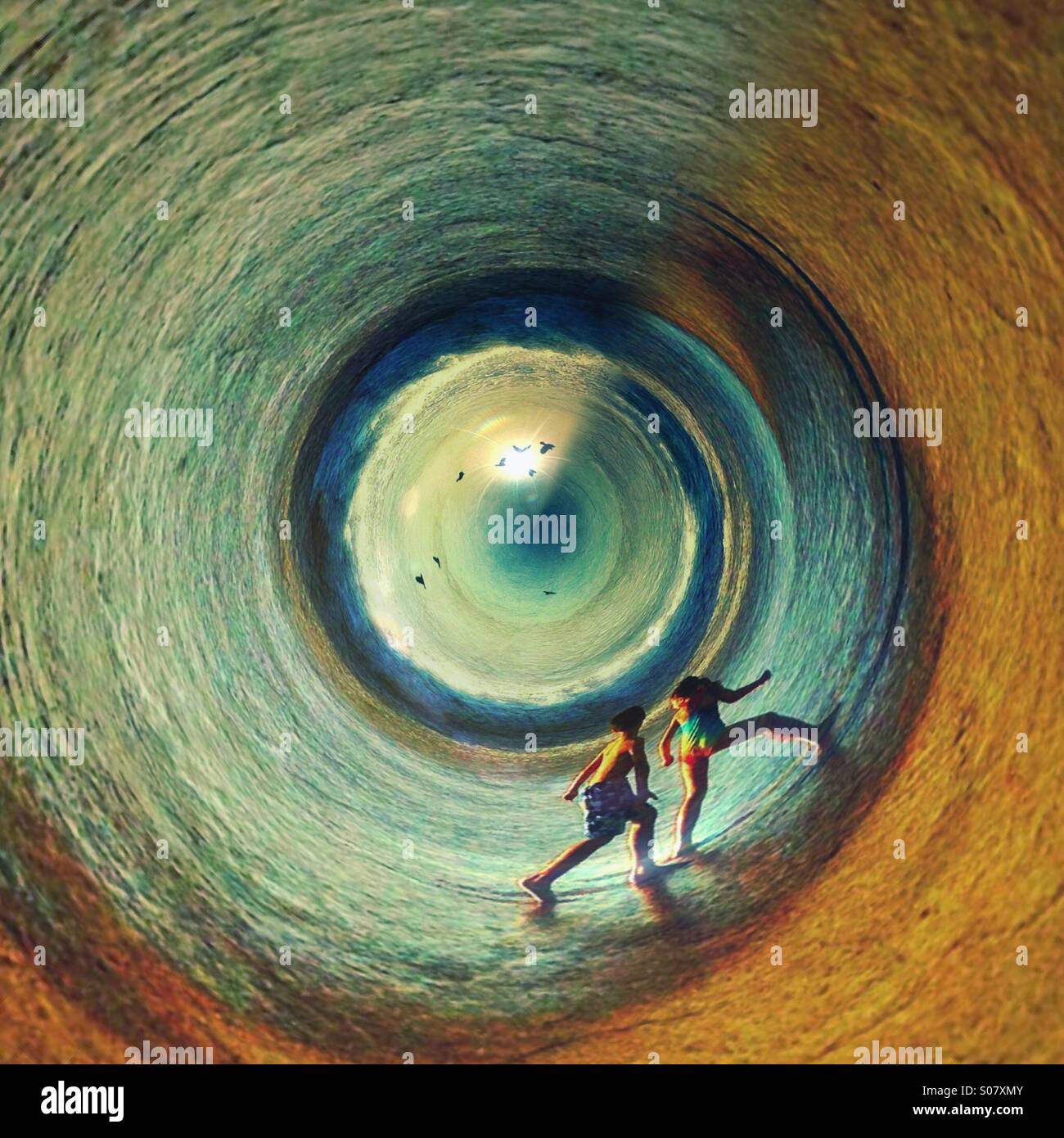 Kids running from waves hi-res stock photography and images - Alamy