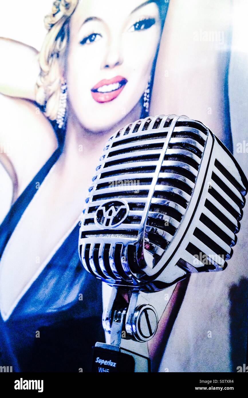 Singer with vintage microphone hi-res stock photography and images - Alamy