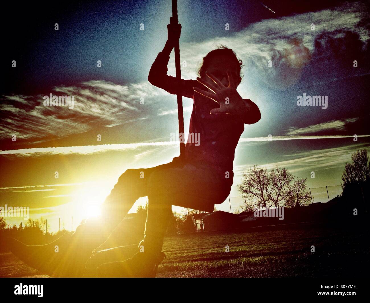 Young girl on zip wire Stock Photo - Alamy