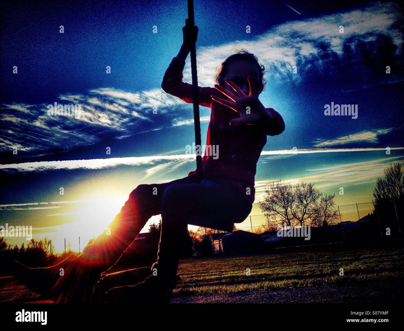Young girl on zip wire Stock Photo - Alamy