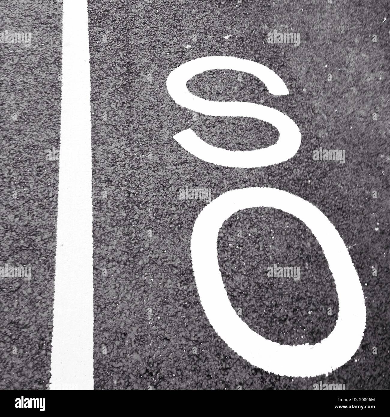 So - sign painted on road Stock Photo - Alamy