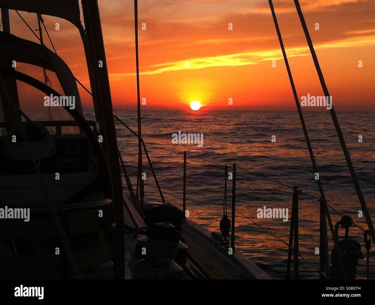 Sunset sea boat hi-res stock photography and images - Alamy
