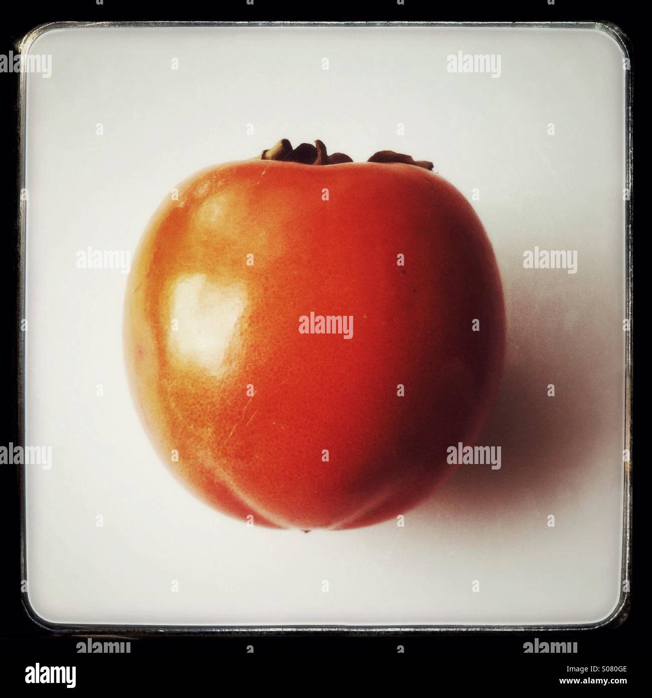 Sharon fruit or Persimon fruit Stock Photo - Alamy