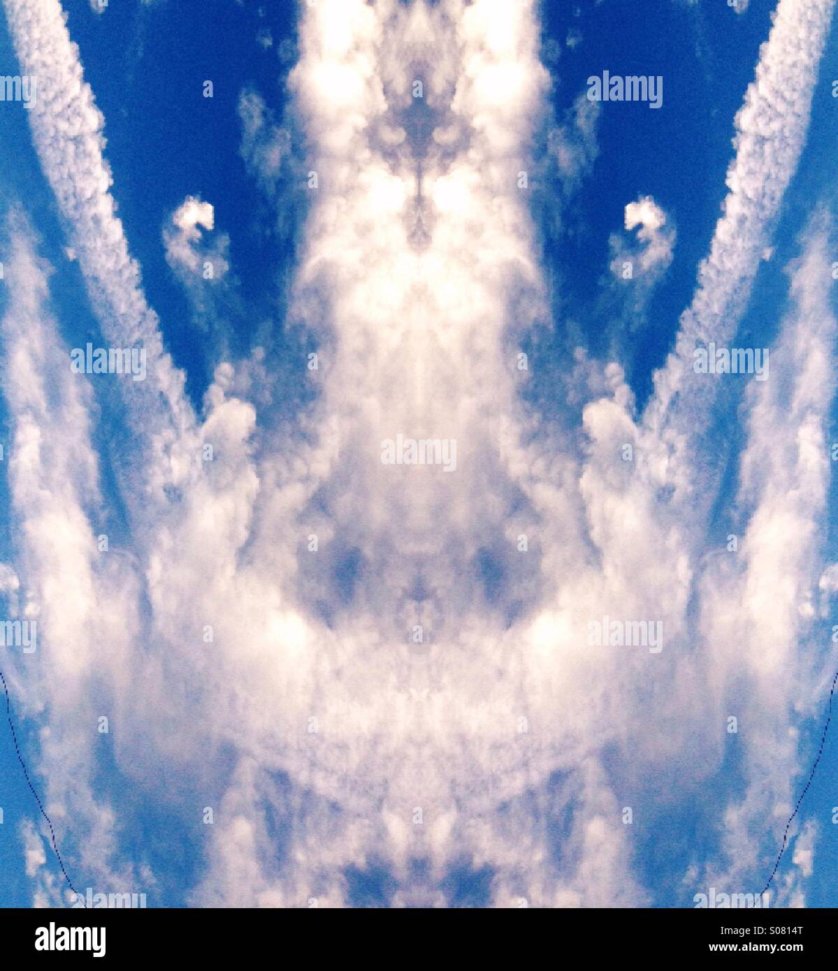 Symmetrical photo of clouds Stock Photo - Alamy