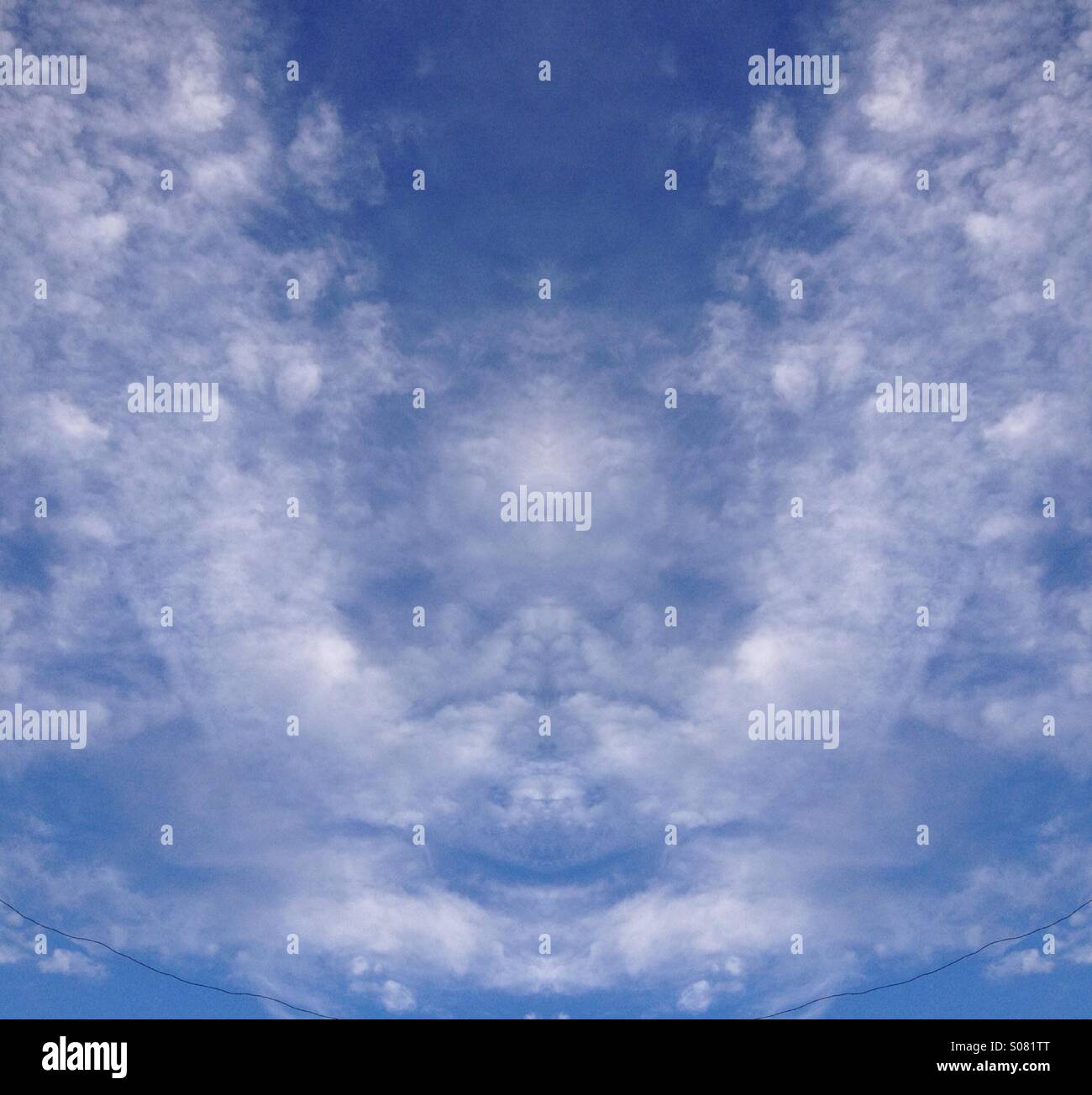 Symmetrical photo of cloudy sky Stock Photo - Alamy