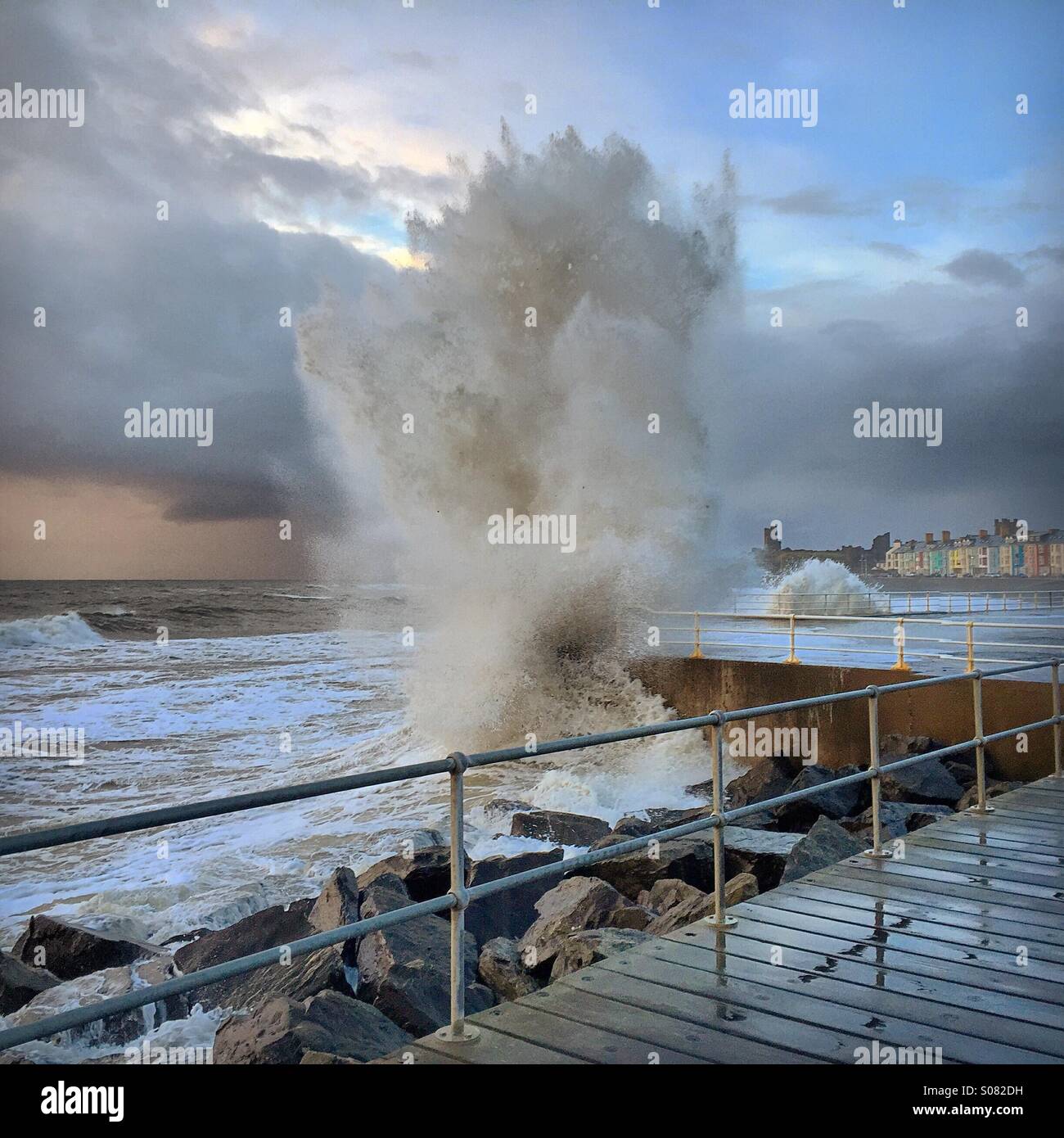 Breaking wave, high tide, Aberystwyth prom, Wales Stock Photo - Alamy