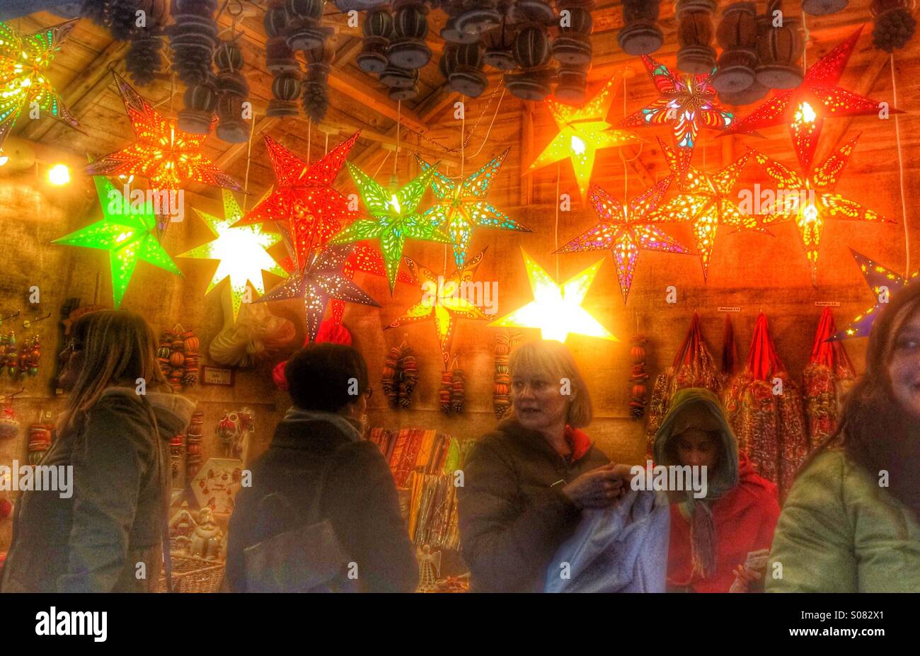 Bright stars in a shop at St Nicholas fair York North Yorkshire England ...
