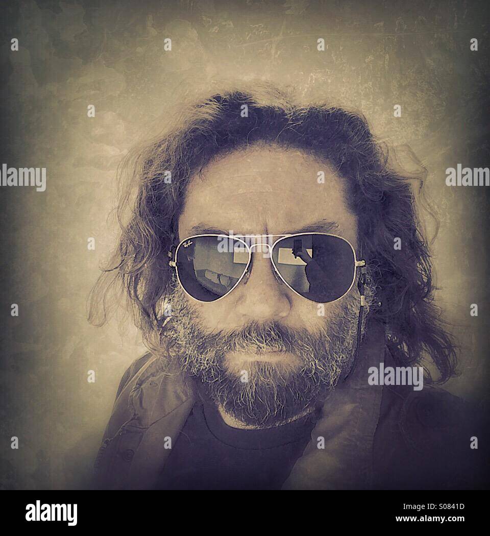 Bearded man with sunglasses Stock Photo - Alamy