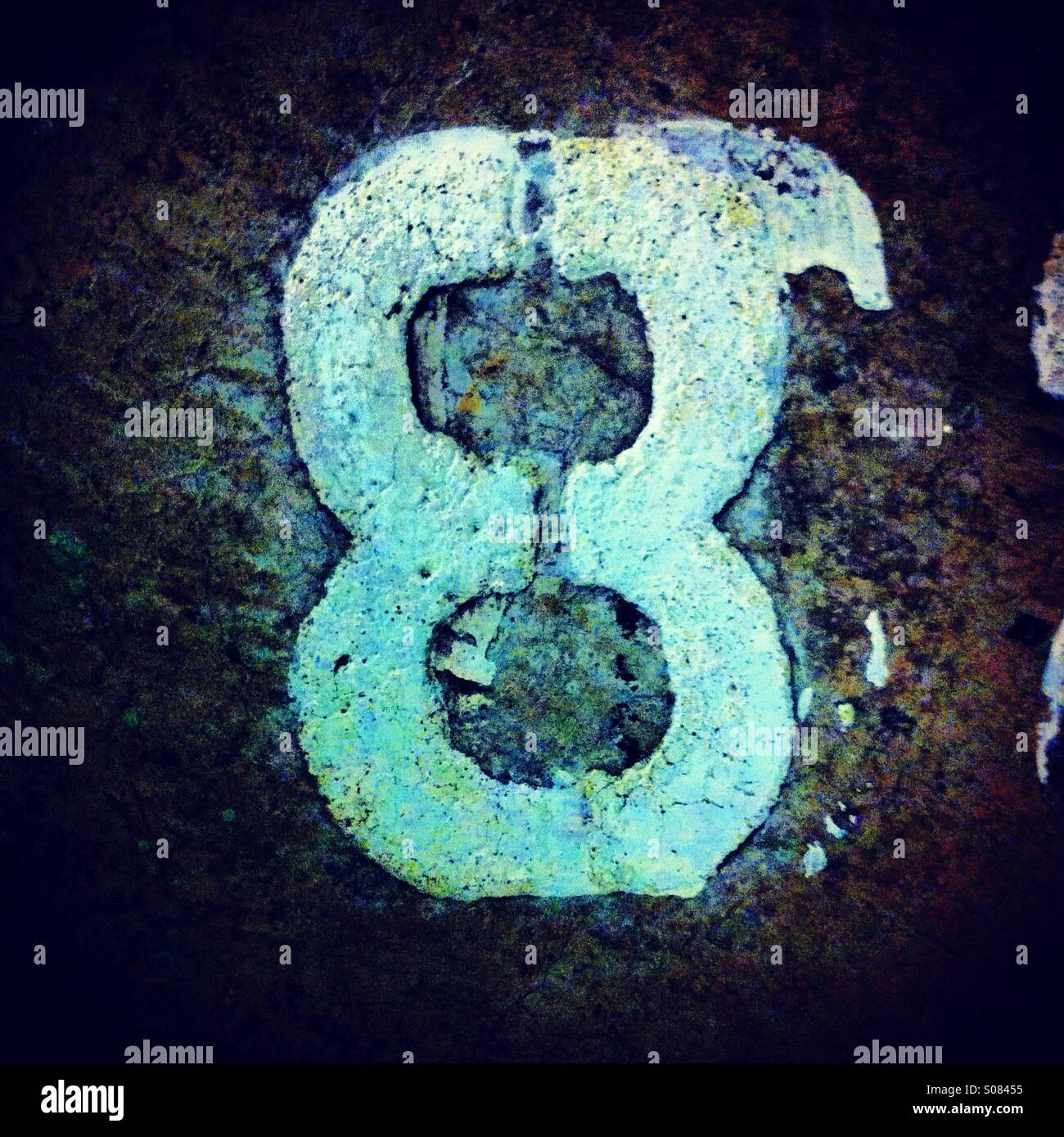 Rough number 8 painted in white color Stock Photo - Alamy