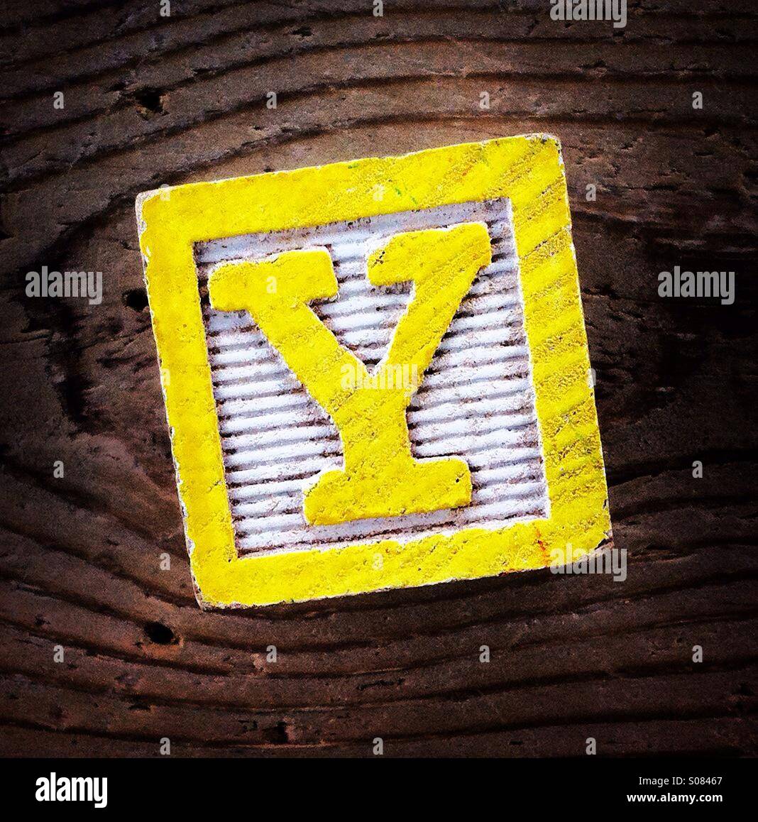 Letter Y on a wood block Stock Photo - Alamy