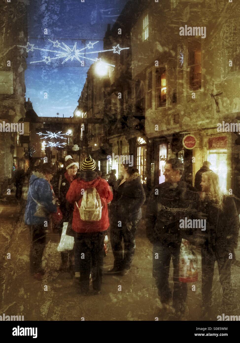 Busy shopping street at night York North Yorkshire England Stock Photo ...