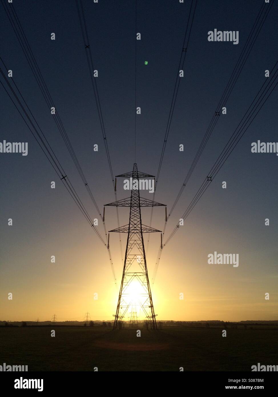 Electricity pylons at sunrise hi-res stock photography and images - Alamy