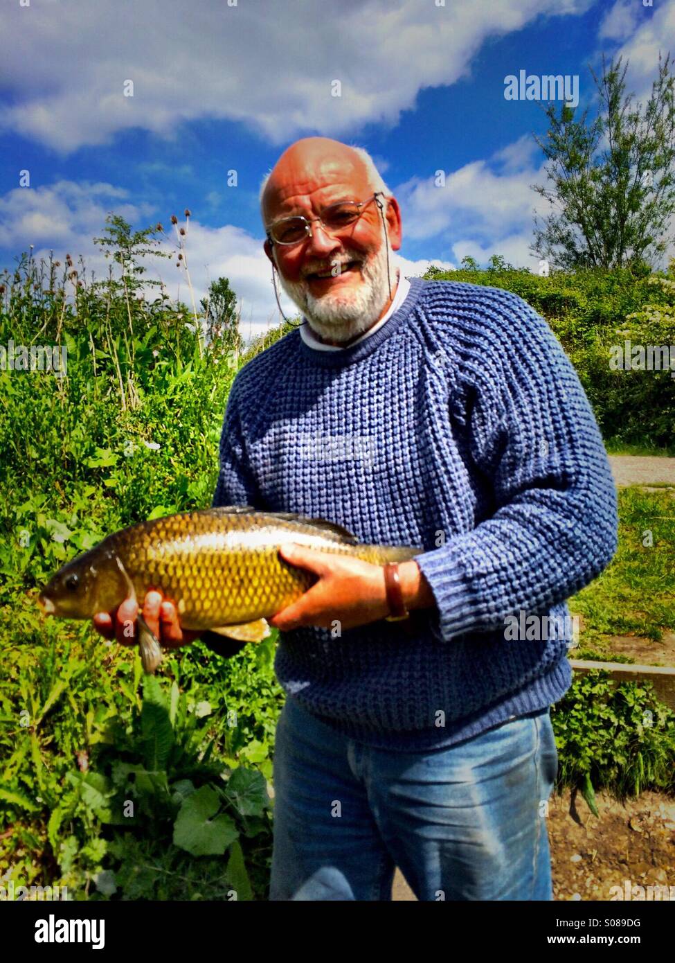 Happy angler hi-res stock photography and images - Alamy