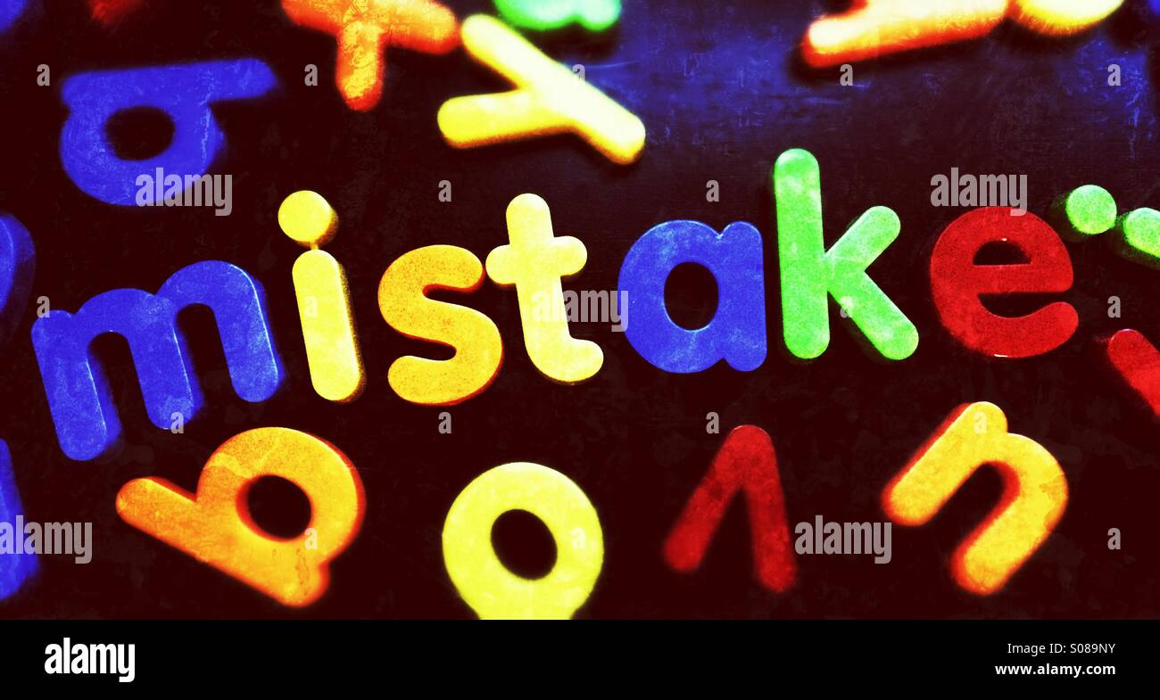 Mistake or error concept in toy fridge magnets Stock Photo - Alamy