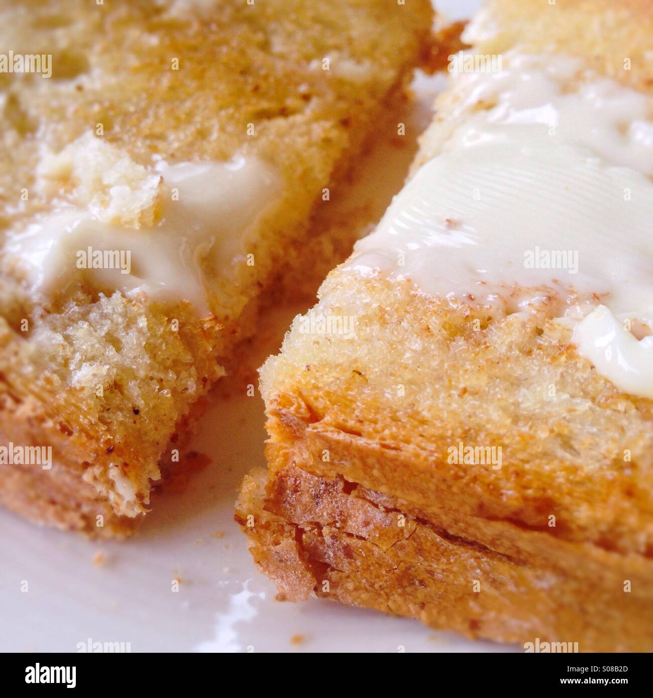 Hot buttered toast Stock Photo - Alamy