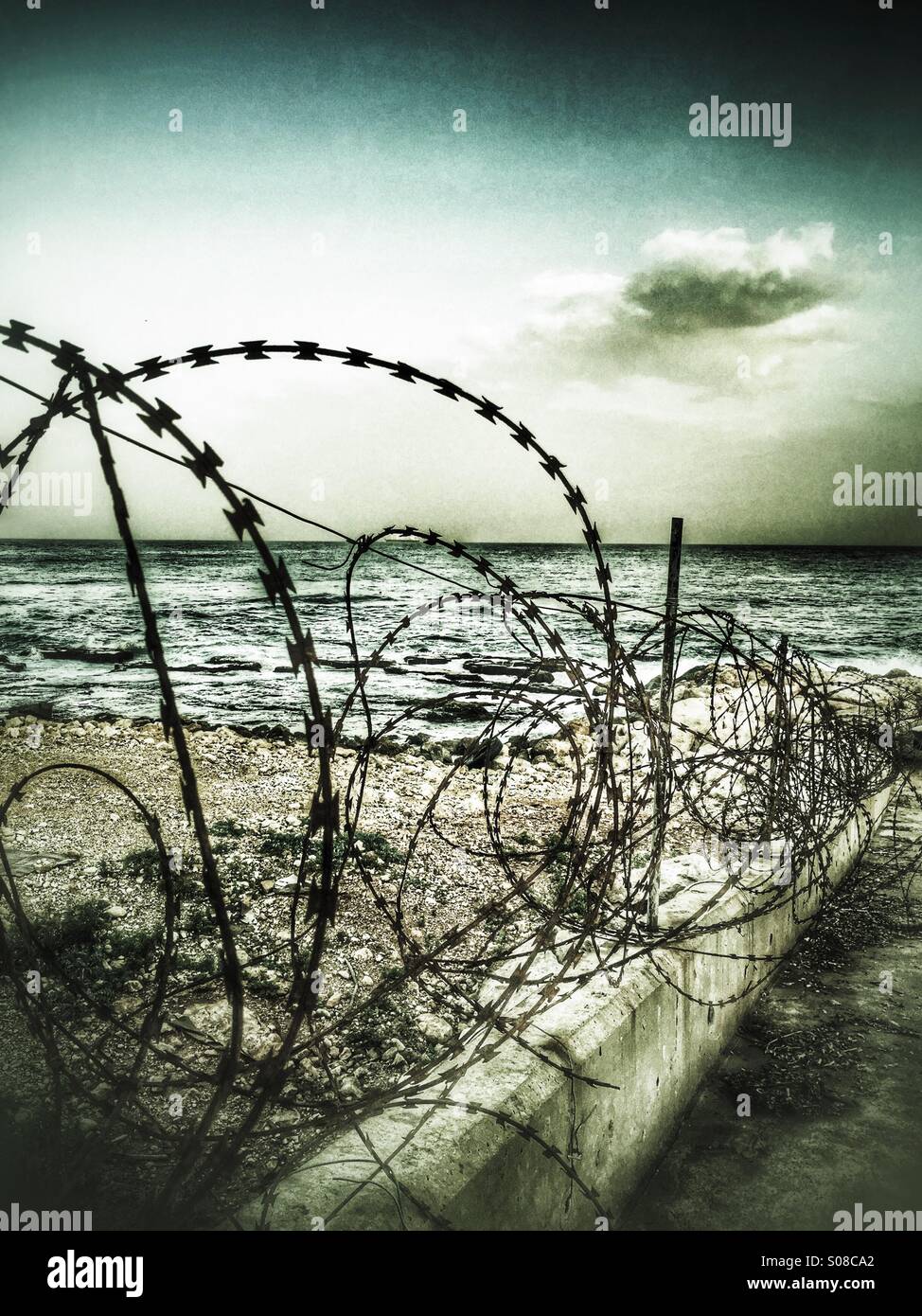 Barbed wire beach hi-res stock photography and images - Alamy
