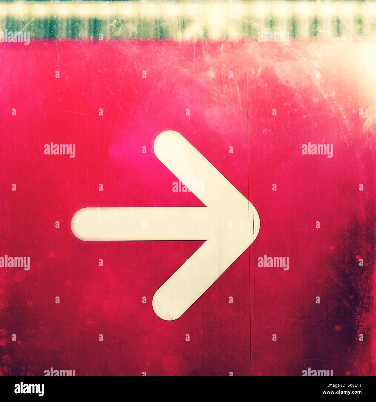 This way - Abstract direction arrow sign Stock Photo - Alamy