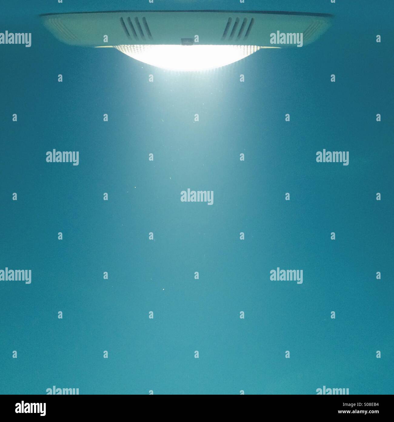 Under blue light hi-res stock photography and images - Alamy