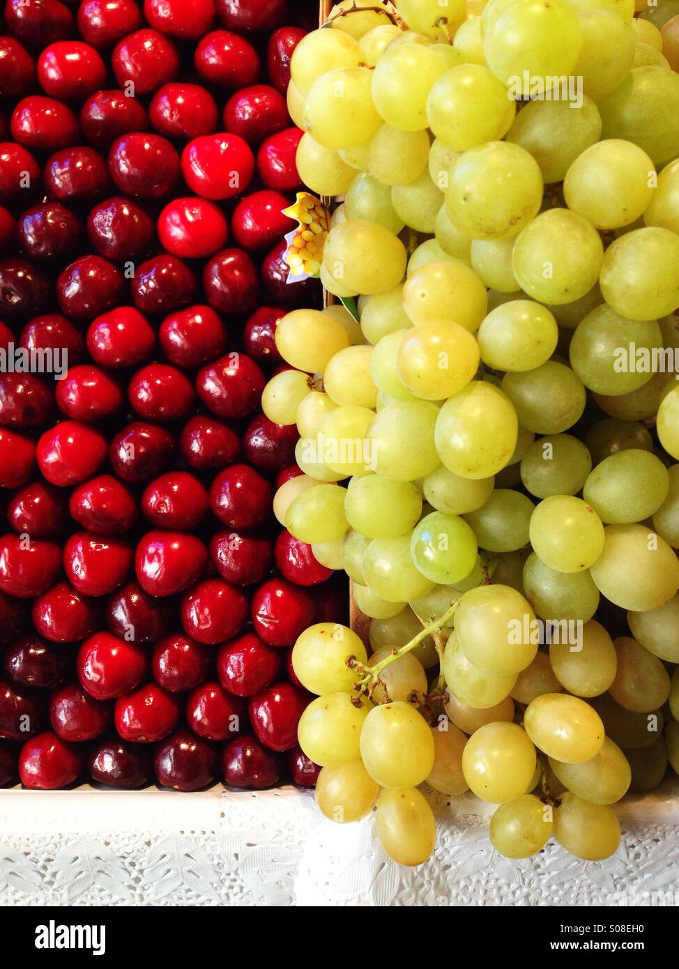 Grapes and cherries on Spanish market stall Stock Photo - Alamy