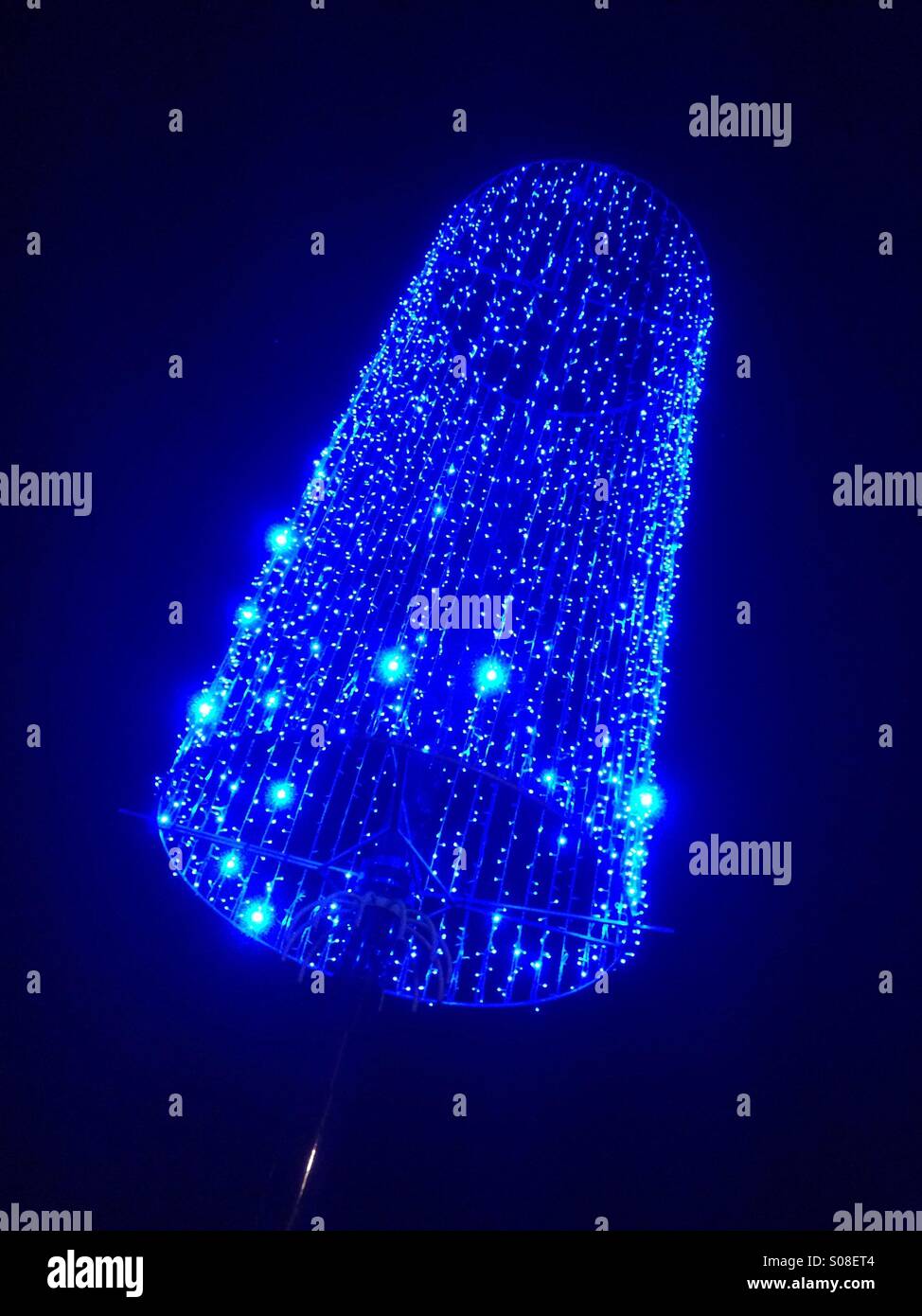 Beautiful sparkly blue Christmas lights against the night sky Stock ...