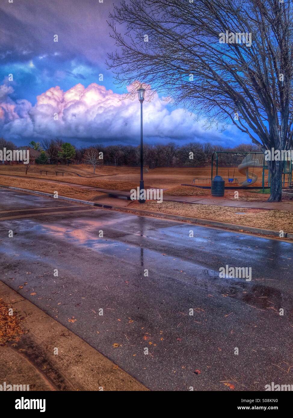 Beautiful clouds and sky are a street side backdrop. HDR Stock Photo ...