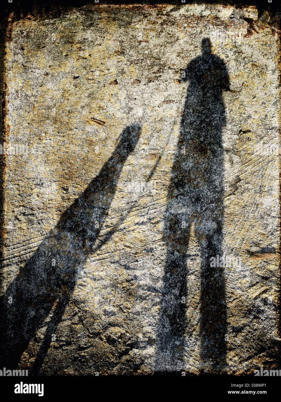 Man and dog shadow hi-res stock photography and images - Alamy