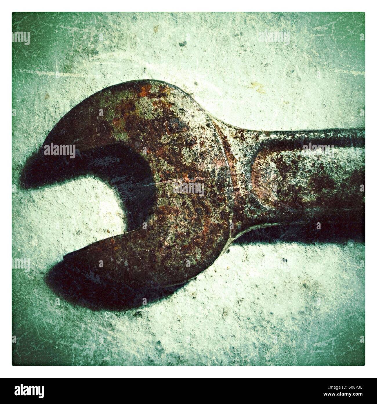 Rusty spanner (wrench) photographed on a concrete floor Stock Photo - Alamy