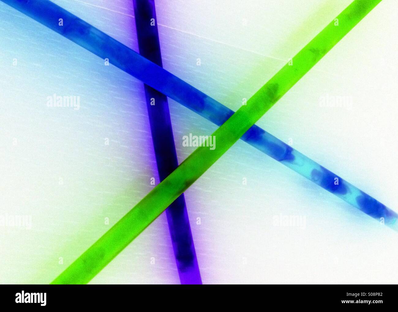 Colour inverted glow sticks Stock Photo - Alamy