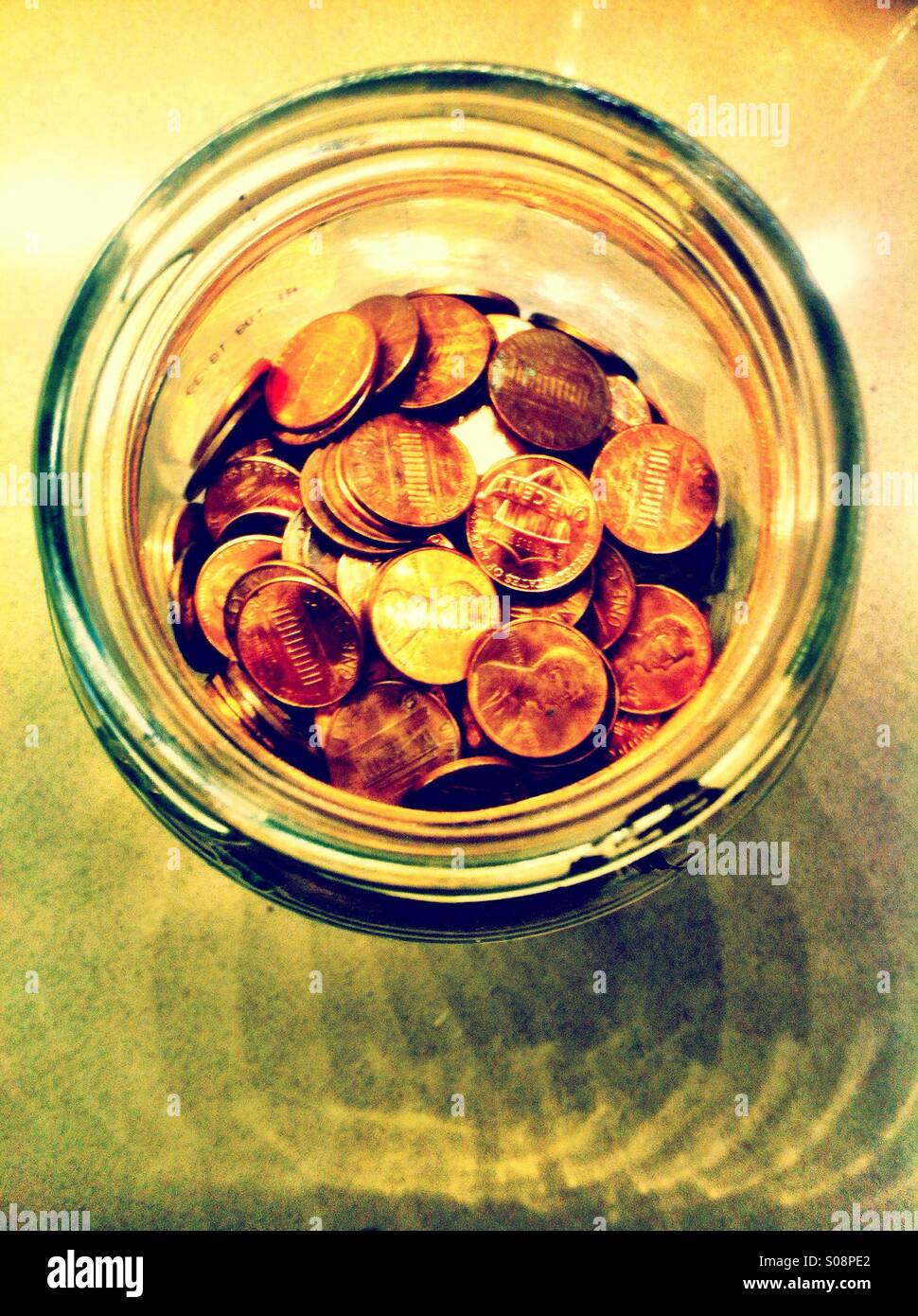 Penny jar hi-res stock photography and images - Alamy