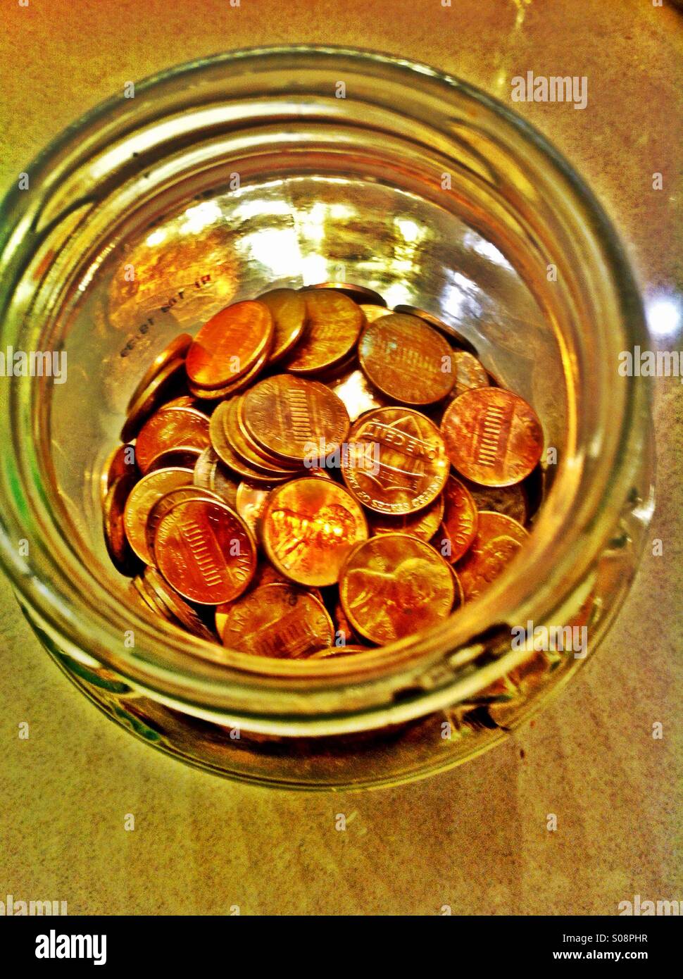 Penny jar hi-res stock photography and images - Alamy