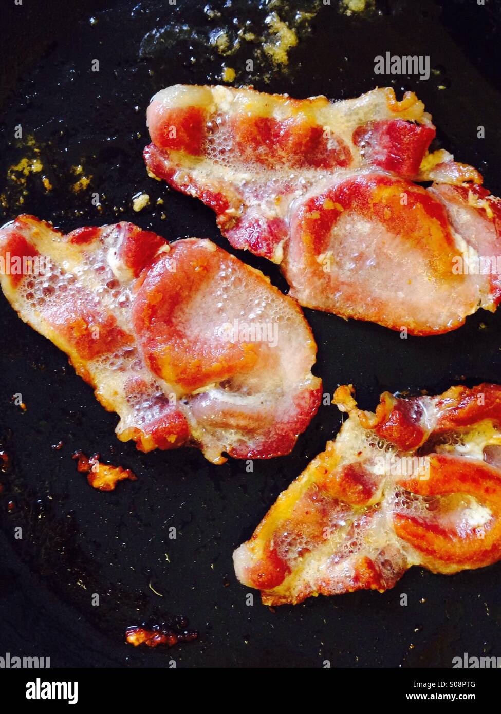 Preparing bacon hi-res stock photography and images - Alamy