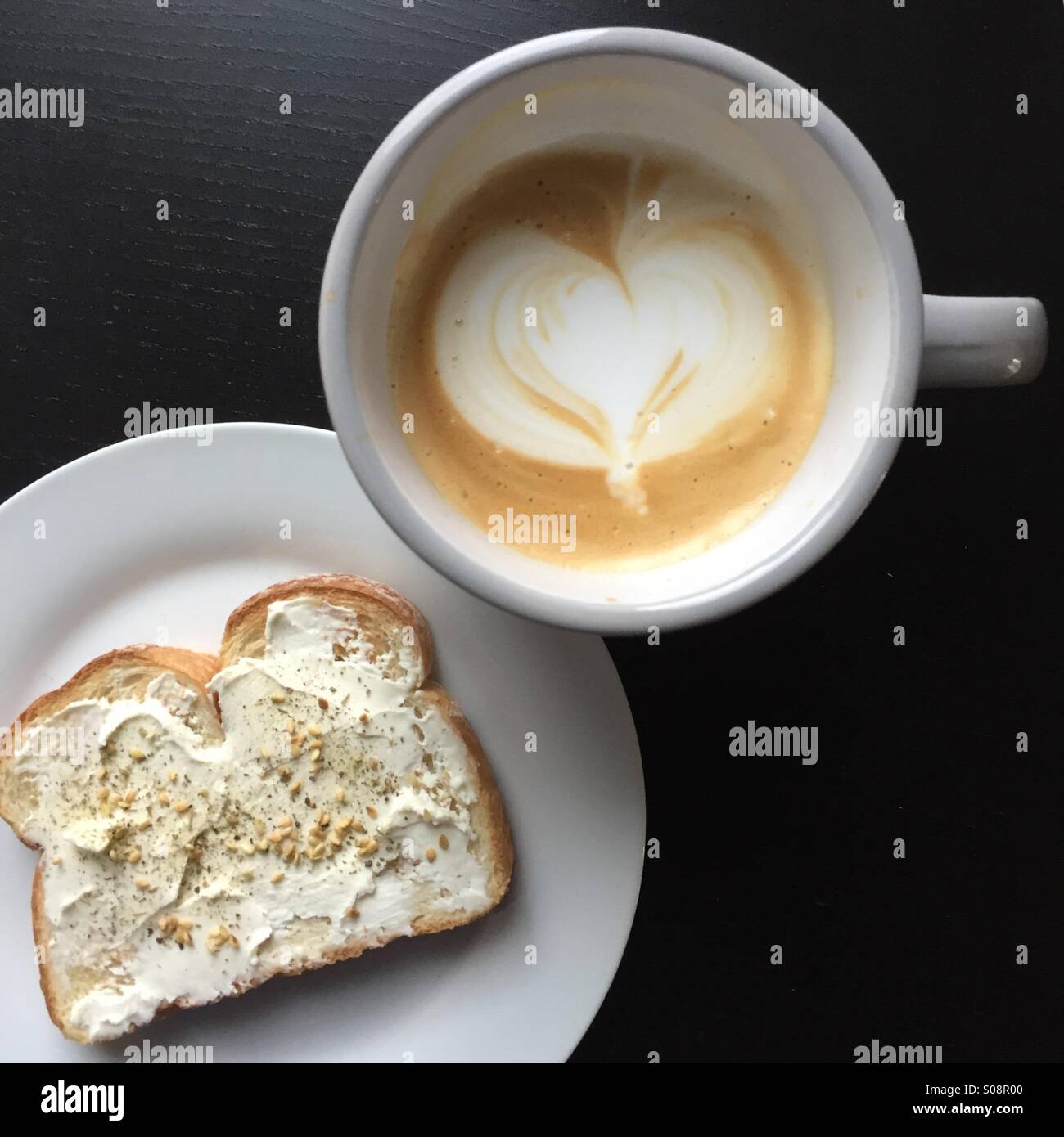 Cream cheese sandwich & latte Stock Photo - Alamy
