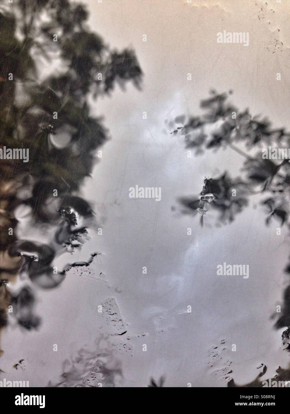 Raining outside the glass window Stock Photo - Alamy