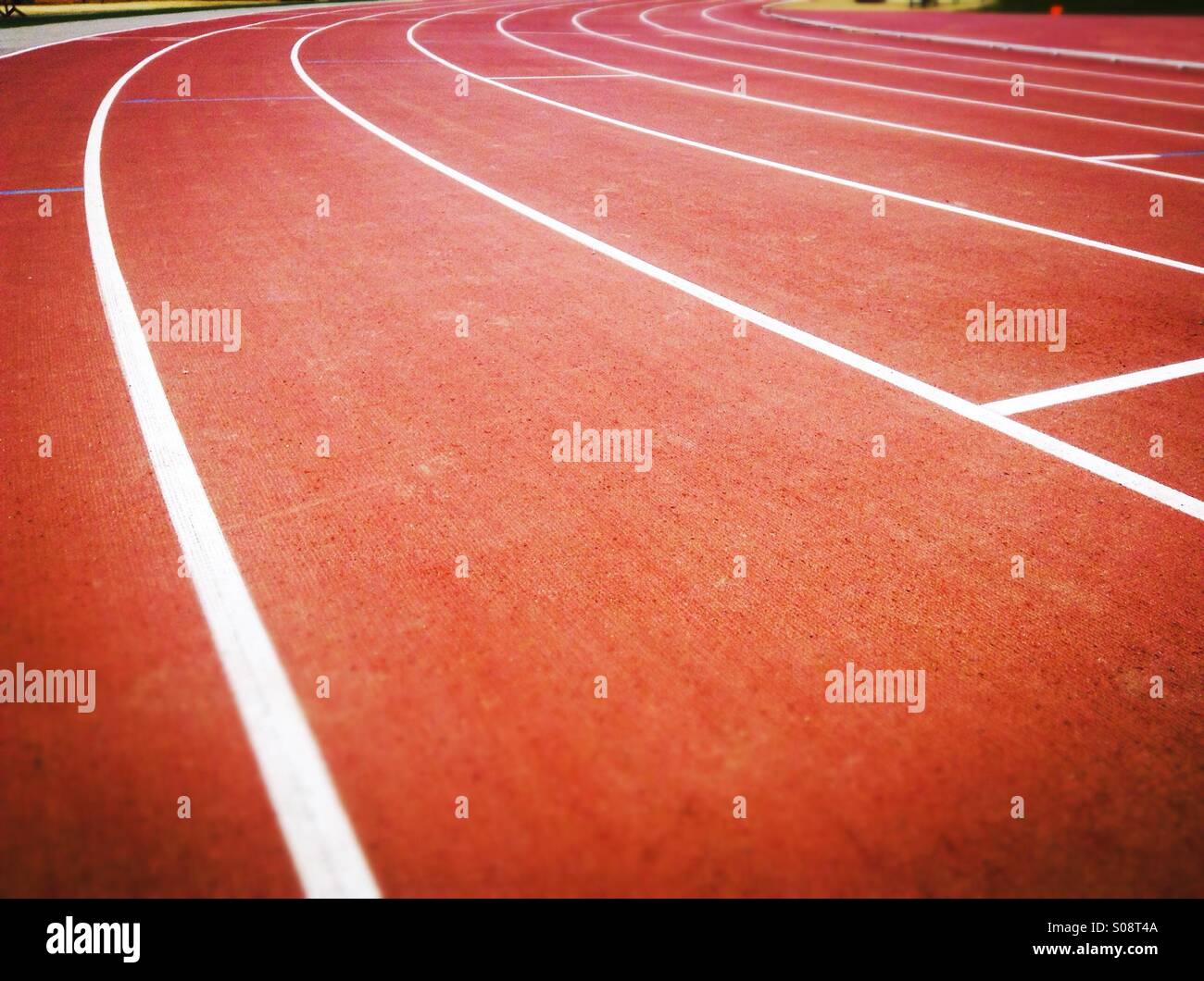 Lanes on running track Stock Photo - Alamy