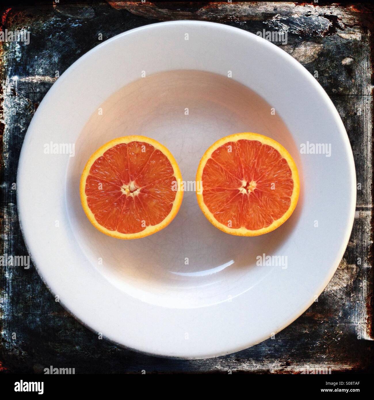 Two halves of an orange hi-res stock photography and images - Alamy