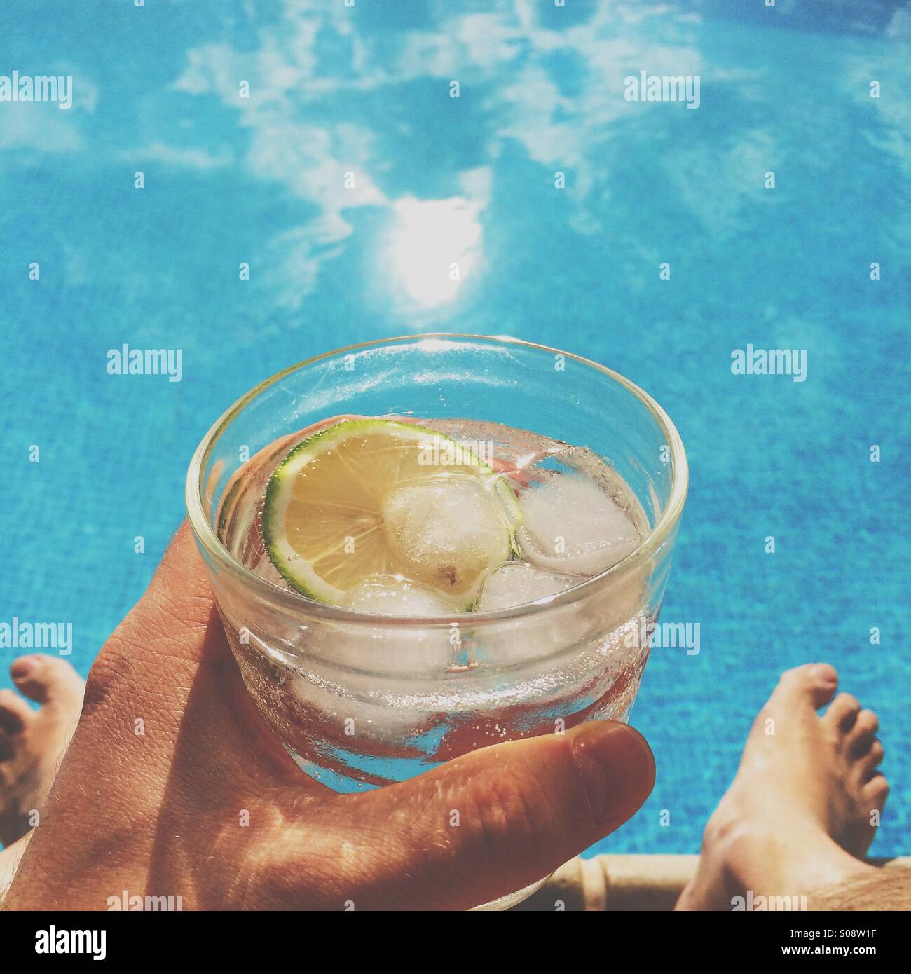 Poolside gin and tonic Stock Photo - Alamy