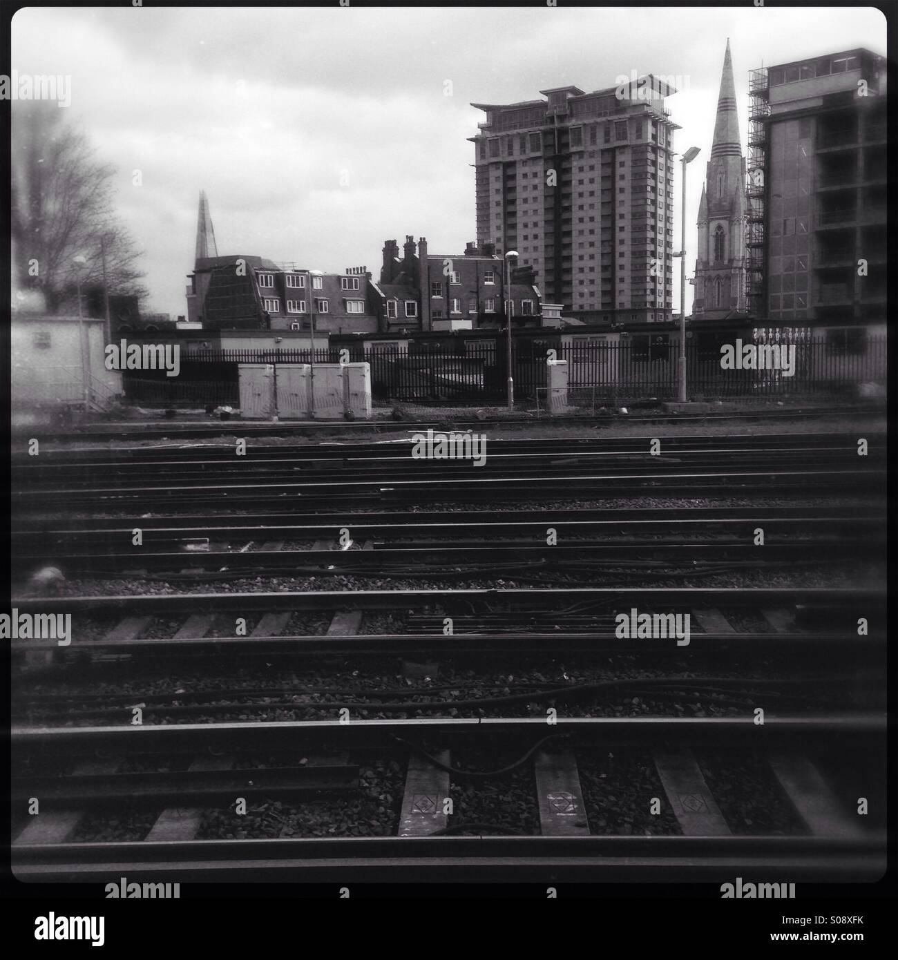 Train tracks and buildings Stock Photo - Alamy