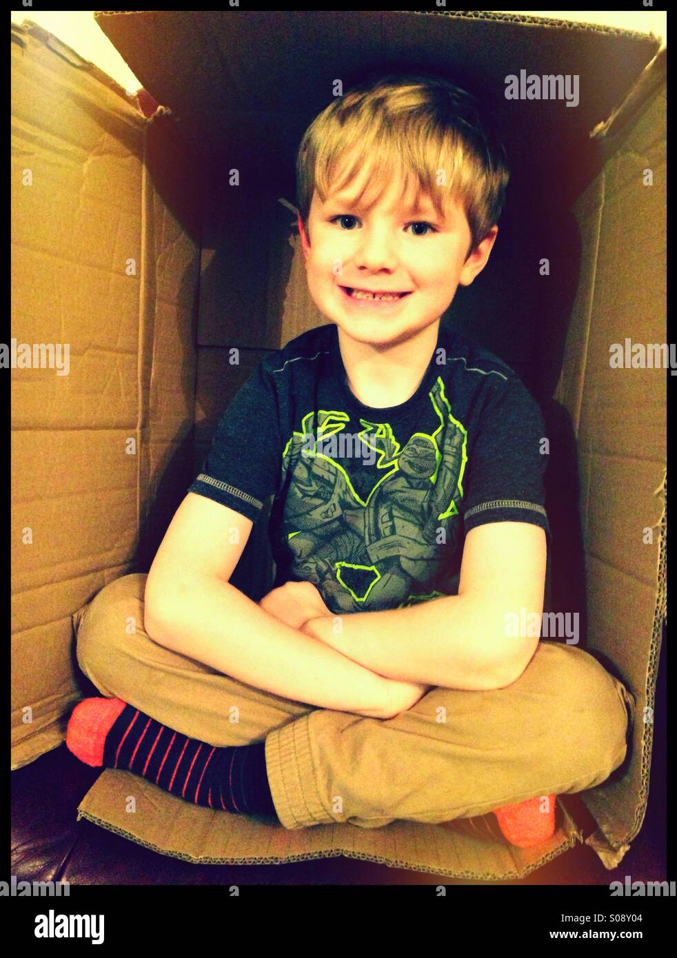 Boy in the box hi-res stock photography and images - Alamy