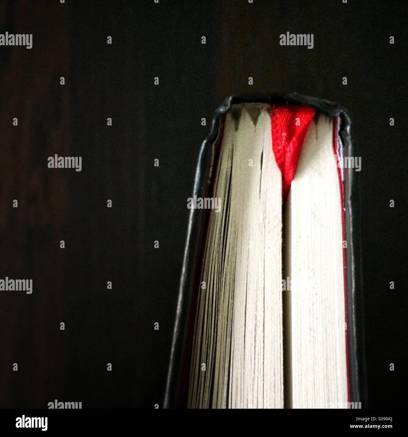 Book with a bound bookmark Stock Photo - Alamy