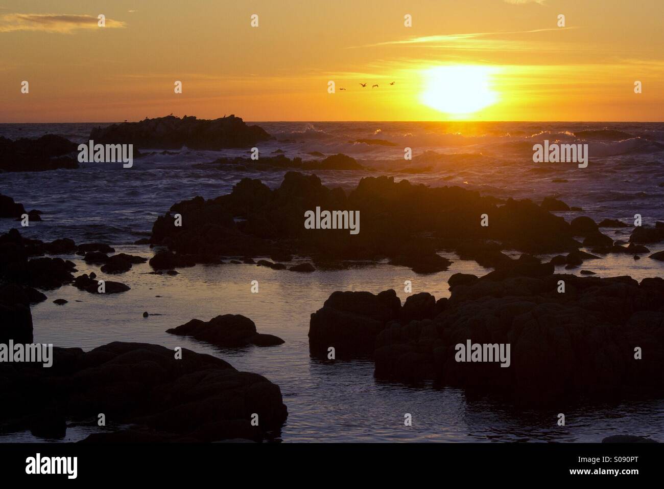 Rocky Coast Sunset Stock Photo - Alamy