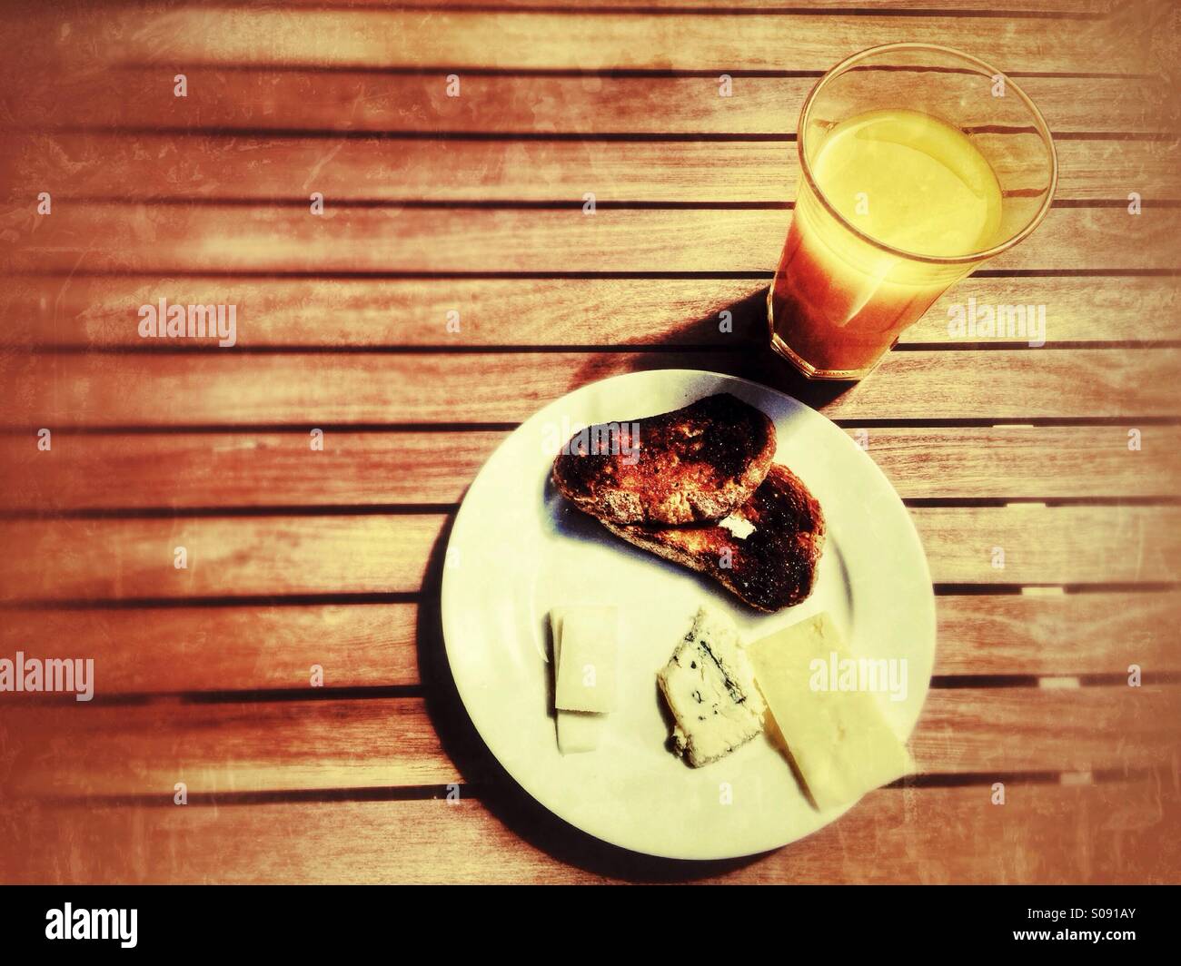 Break fast made of toast cheese and orange juice Stock Photo - Alamy